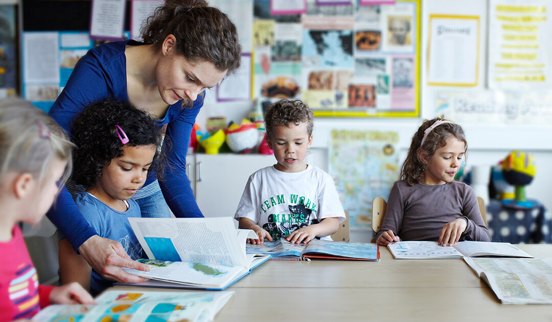 Teacher Helping Student